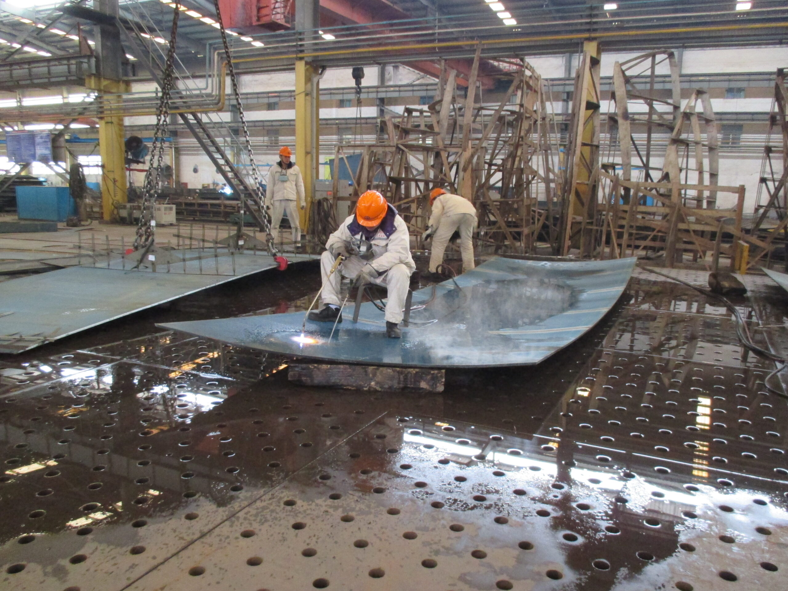 Material impact of line-heating in shipbuilding on steel panels - Nieland